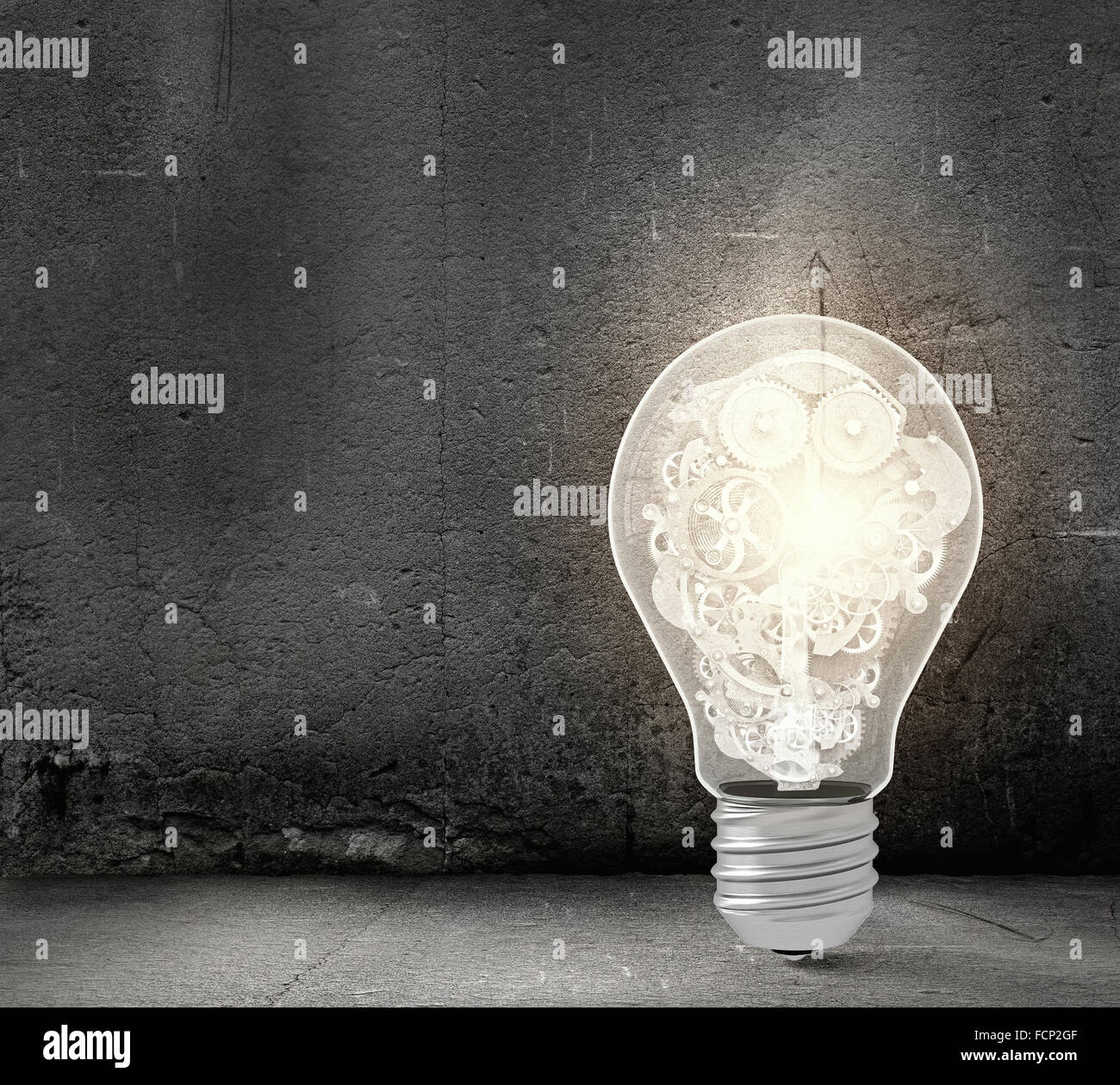 Concept of mechanism light bulb with gears inside Stock Photo - Alamy