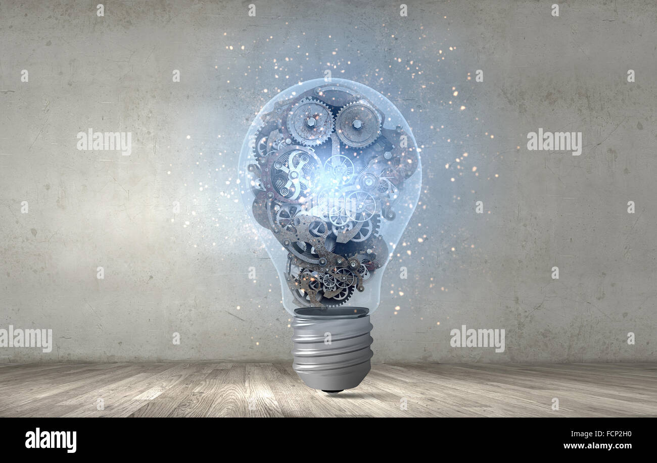Concept of mechanism light bulb with gears inside Stock Photo - Alamy