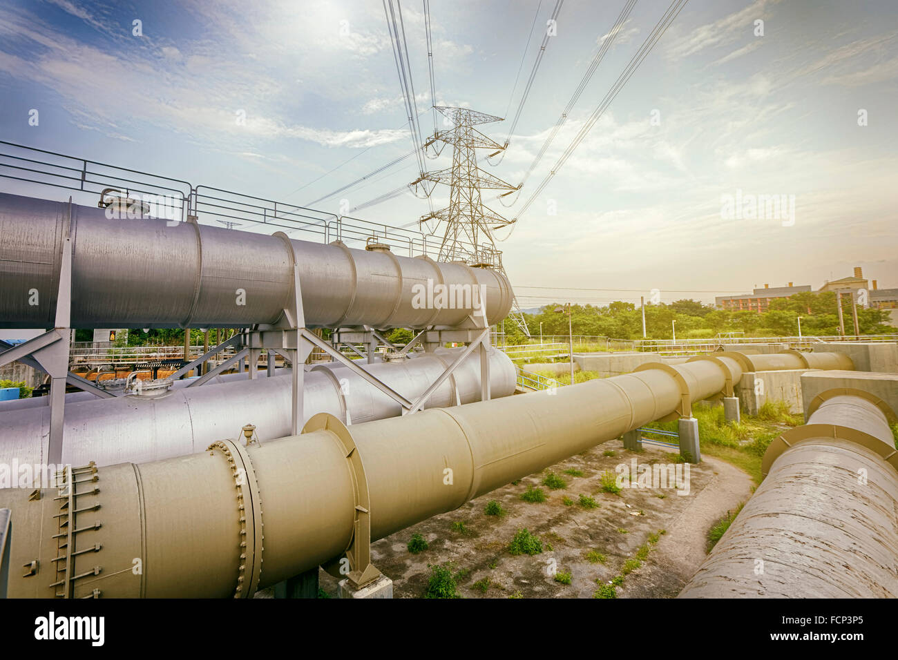 Oil refinery and power tower Stock Photo - Alamy