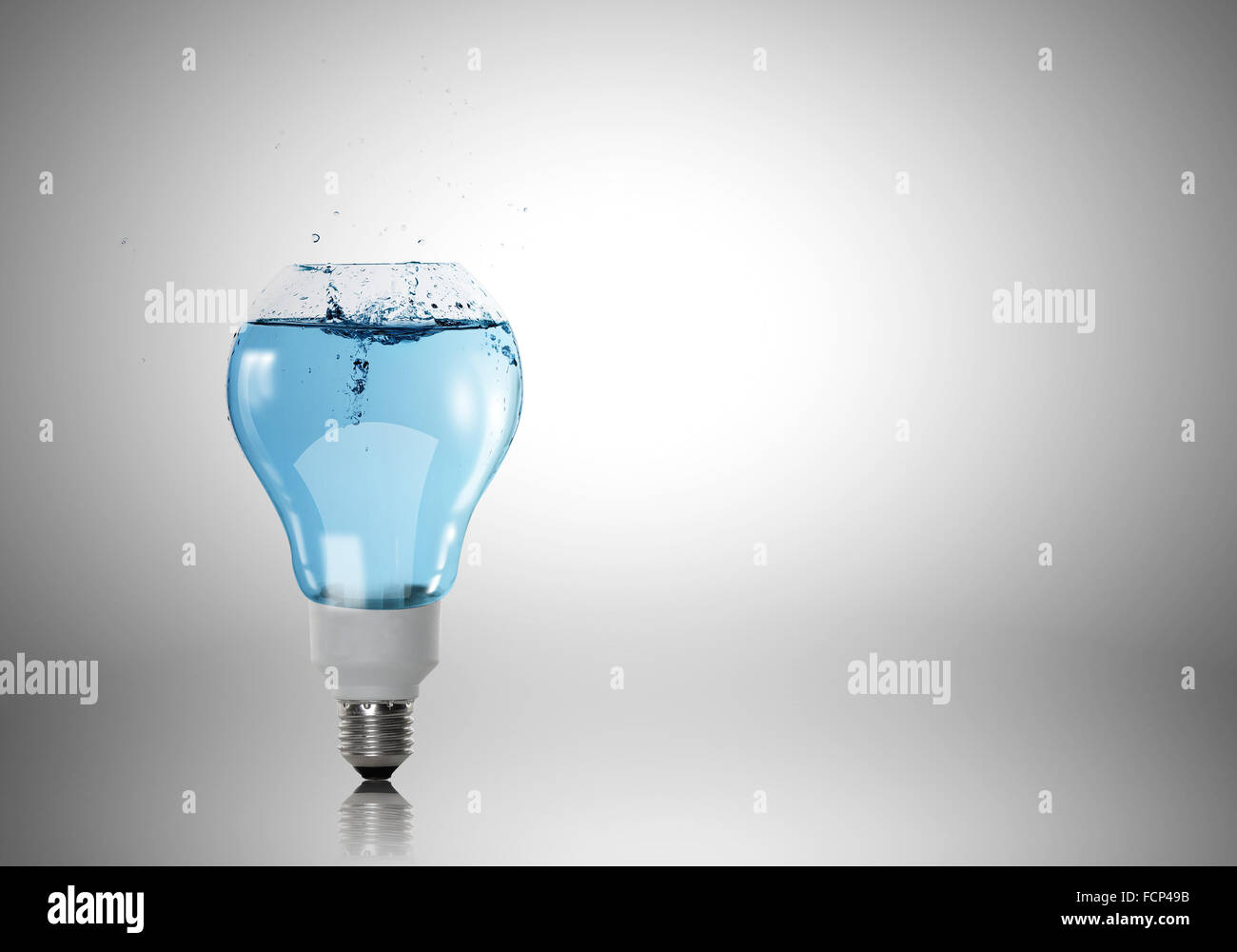Conceptual image with light bulb filled with clear water Stock Photo ...