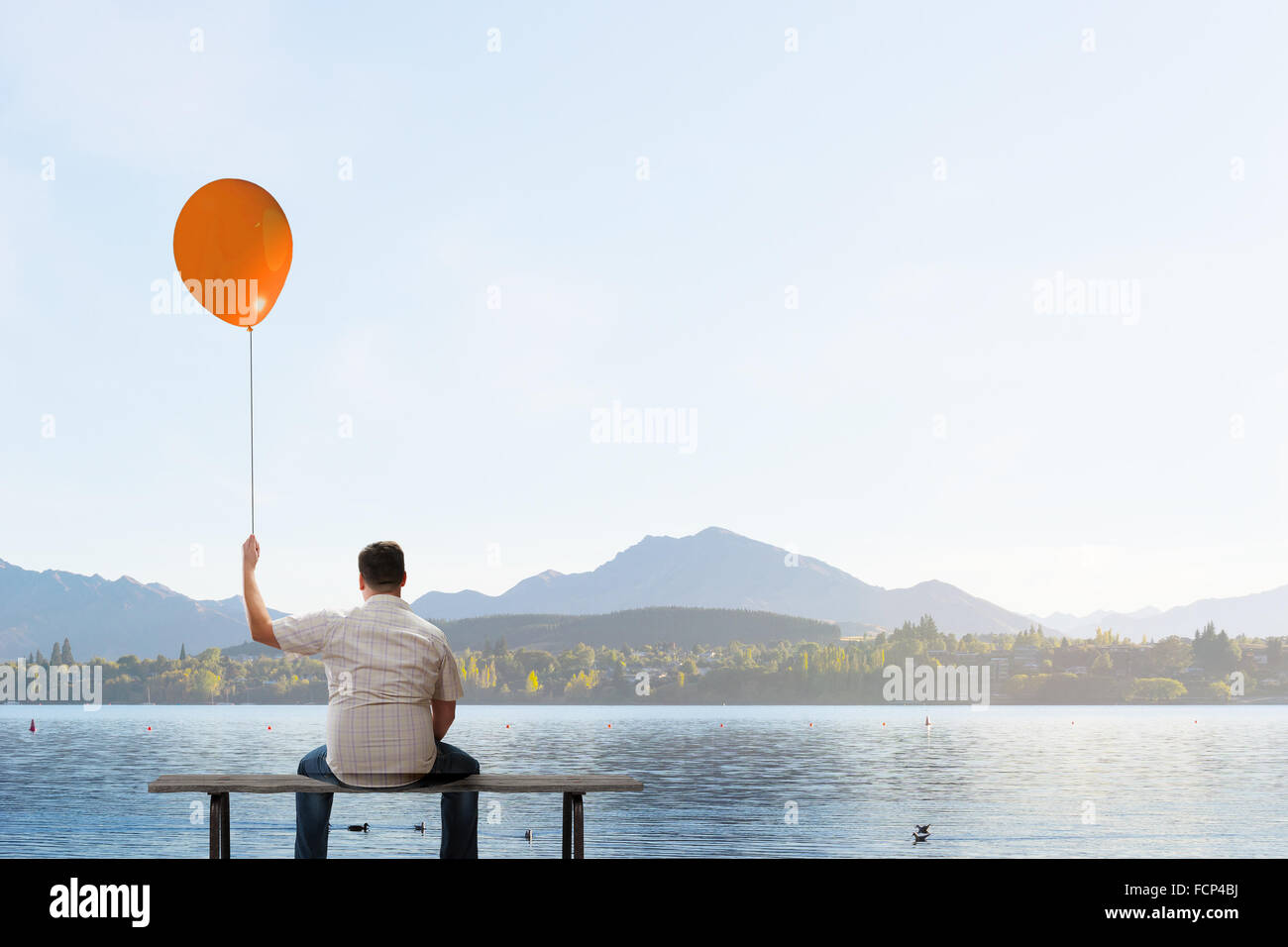 Back fat man sitting on hi-res stock photography and images - Alamy