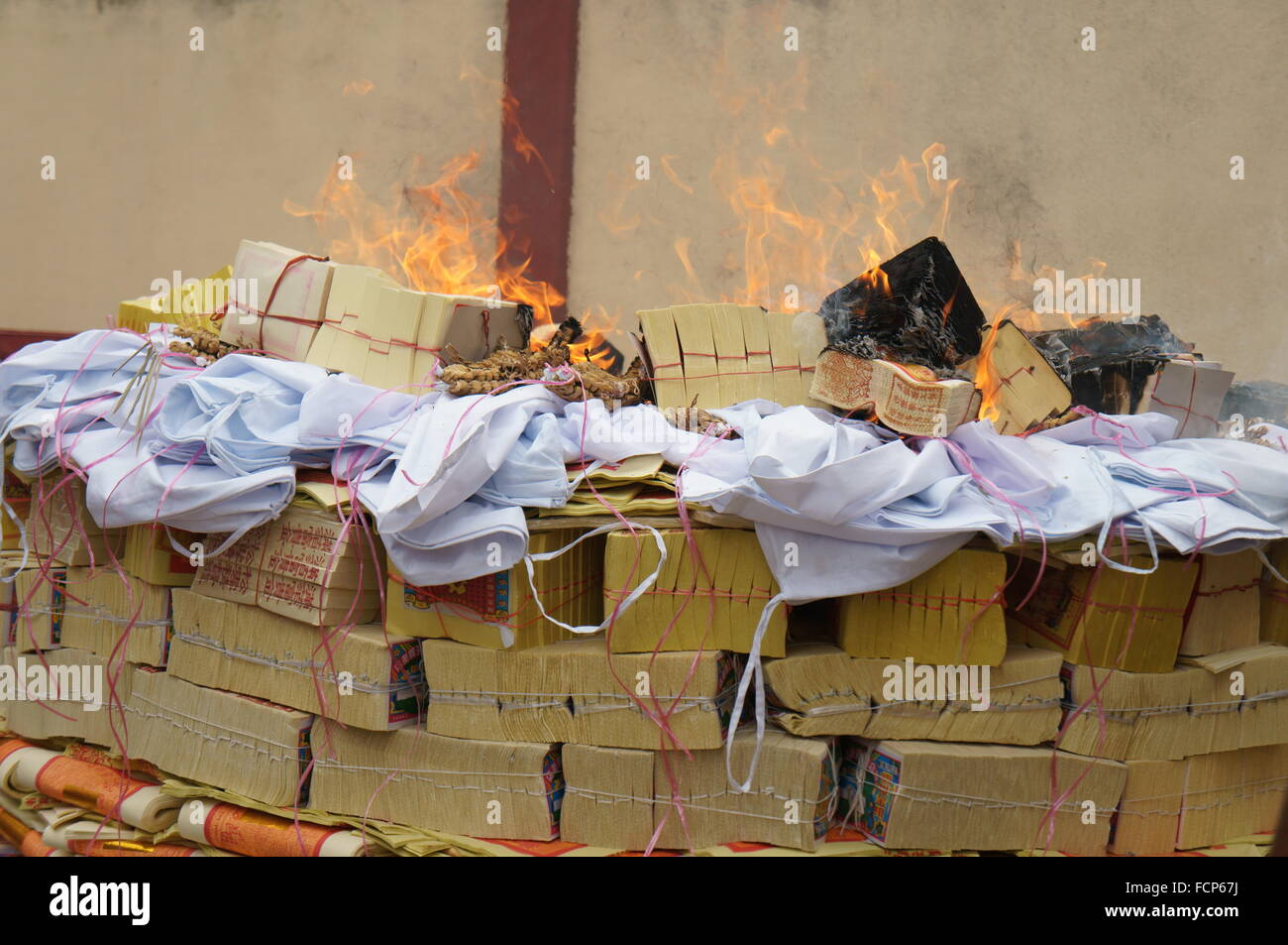burning joss money in traditional Taoist religious ceremony Stock Photo ...