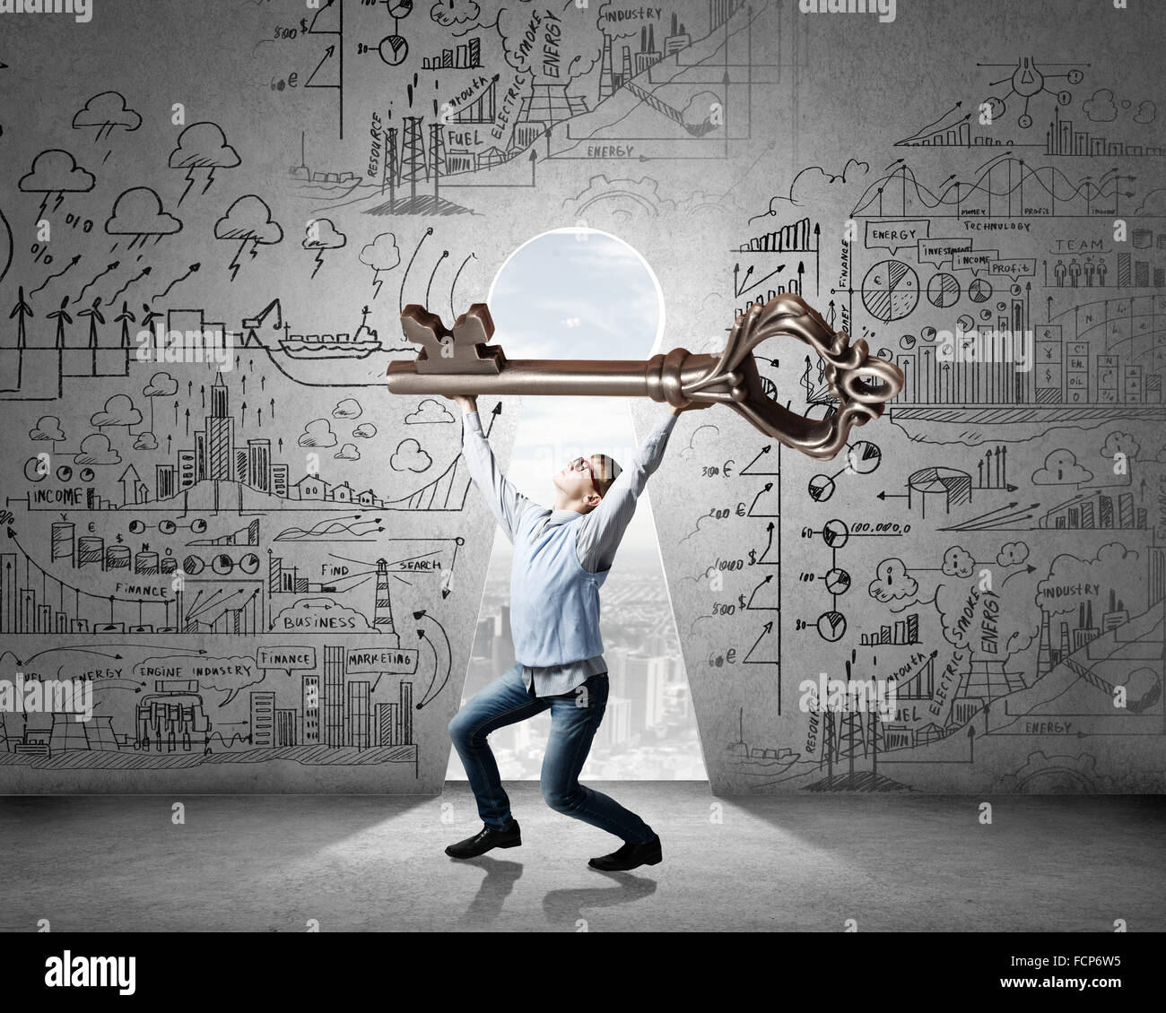 Young man and keyhole at background lifting big key above head Stock ...