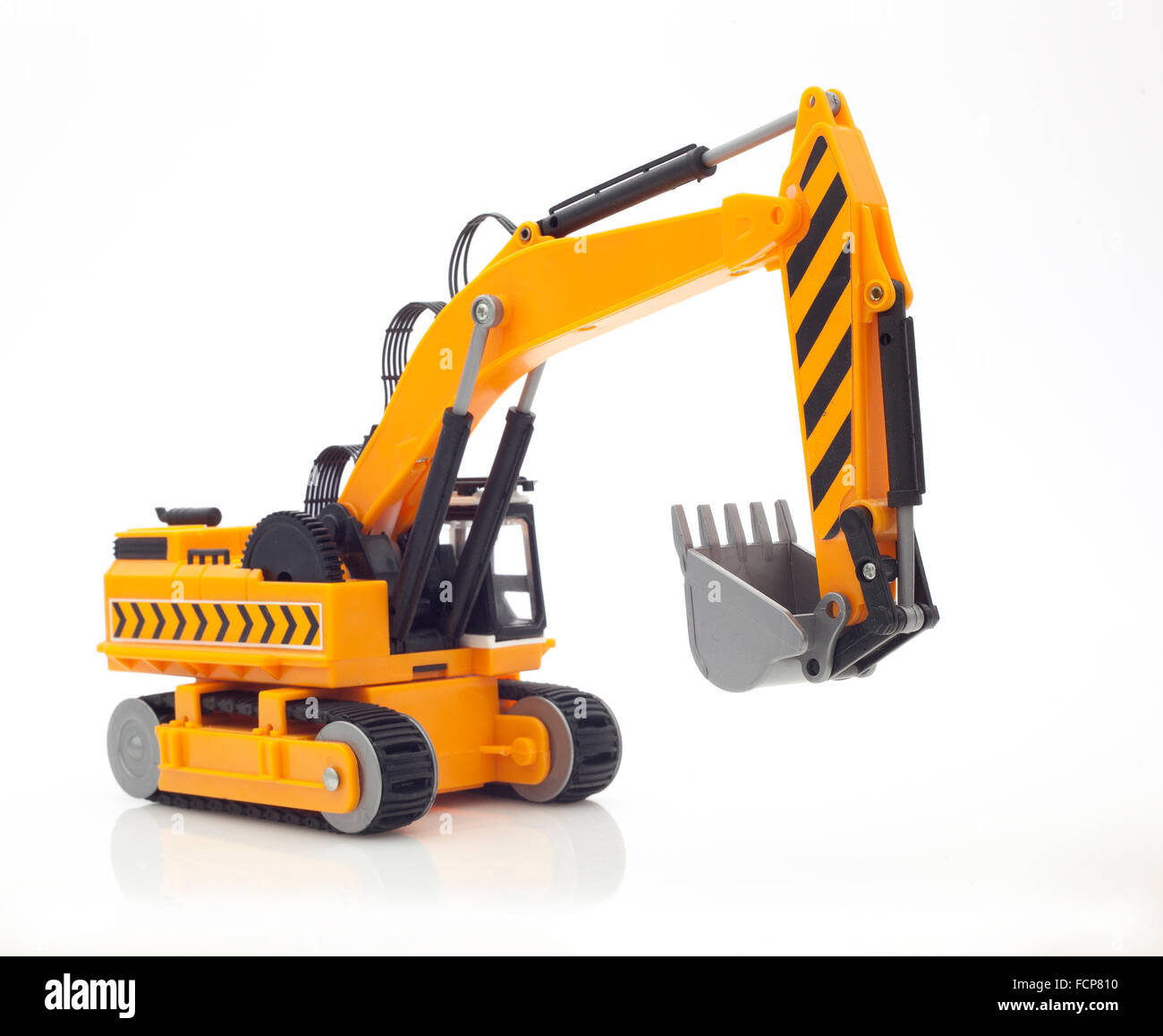 Yellow Toy Digger on a White Background Stock Photo - Alamy