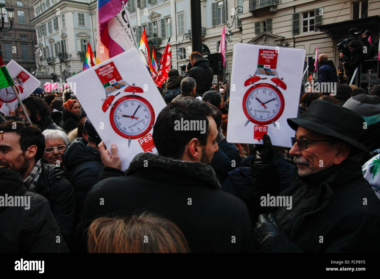 Torino, Italy. 23rd Jan, 2016. People use placards with pictures of ...