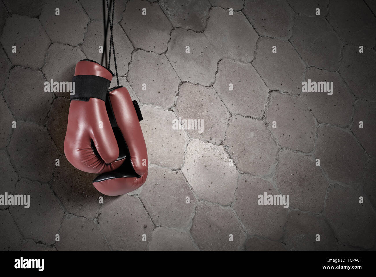 Boxing gloves hanging on nail on wall Stock Photo - Alamy
