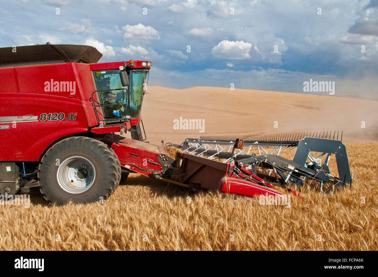 A Case combine harvests grain in the Palouse region of Easter ...