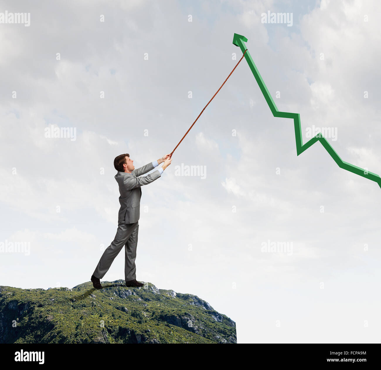 Young businessman caught increasing graph with lead Stock Photo - Alamy