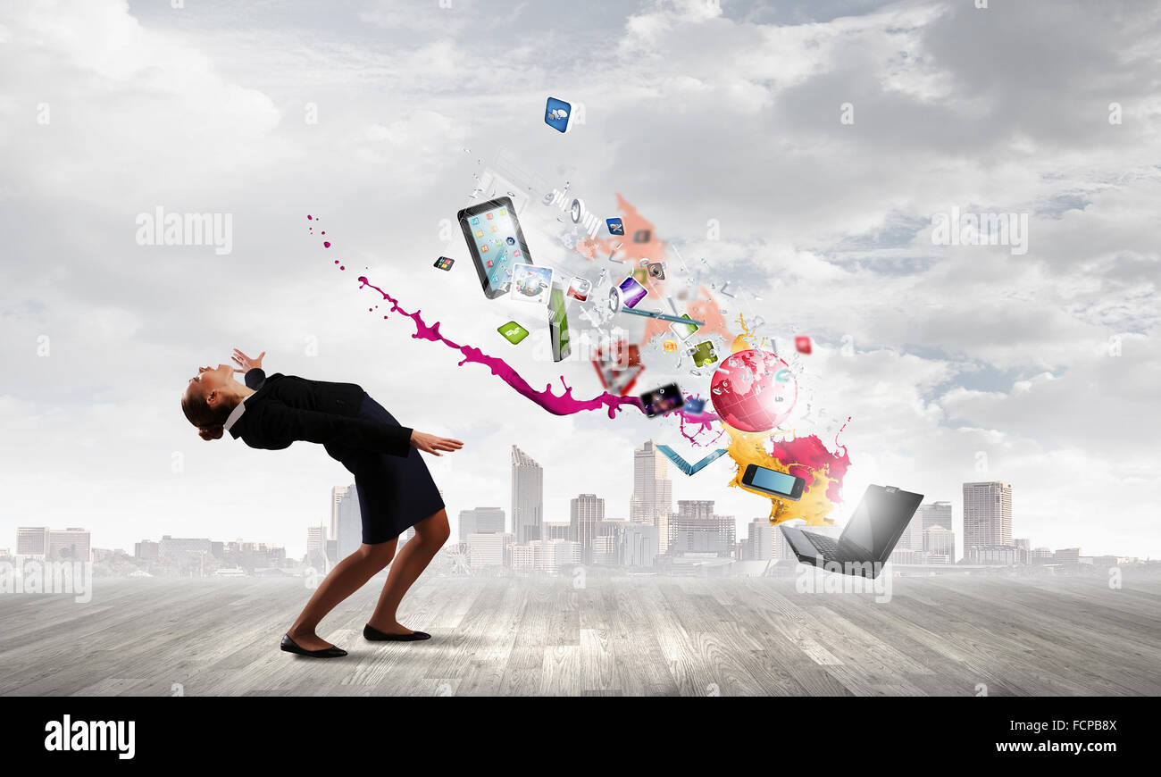 Balancing young woman evading from explosion of ideas Stock Photo - Alamy