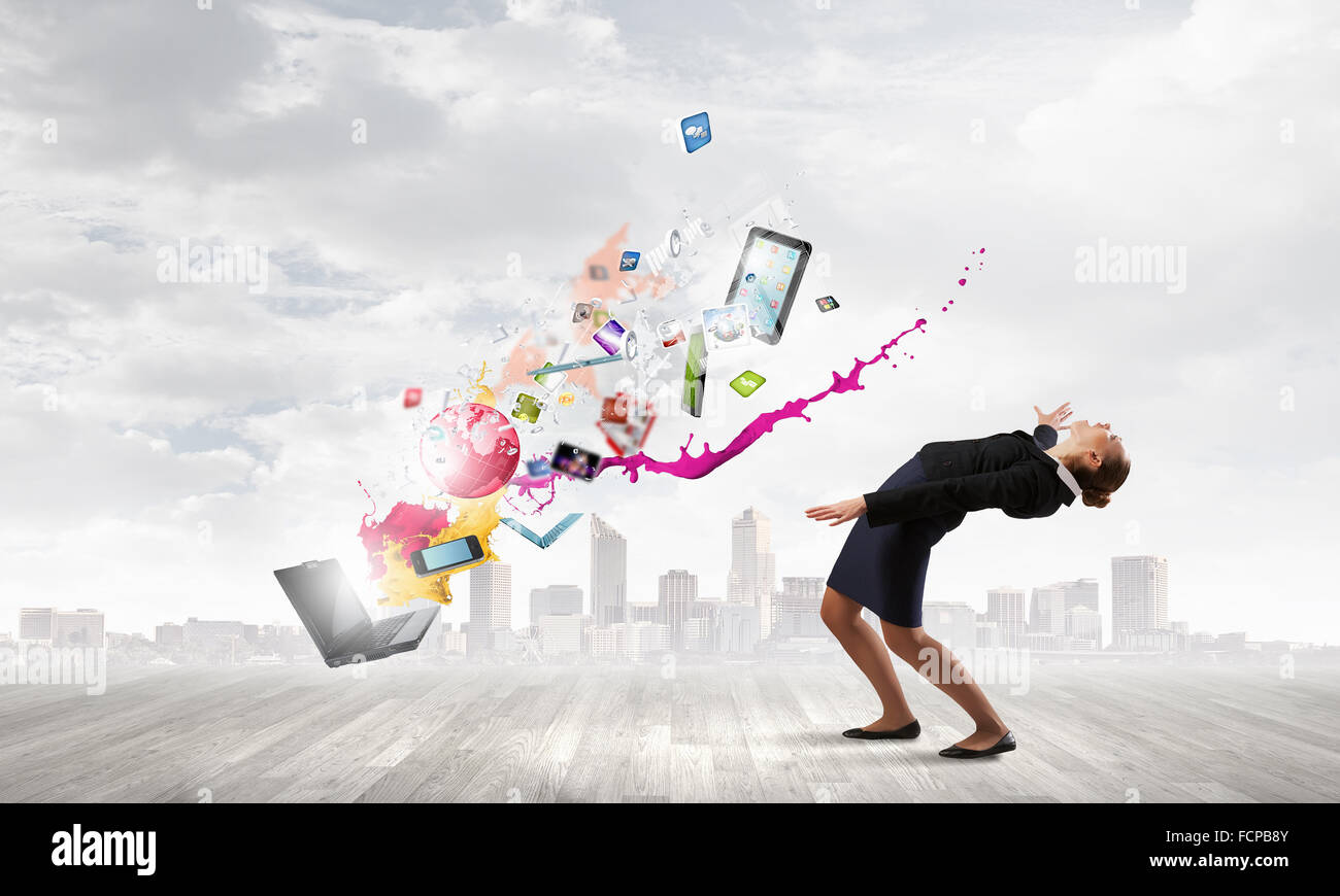 Balancing young woman evading from explosion of ideas Stock Photo - Alamy