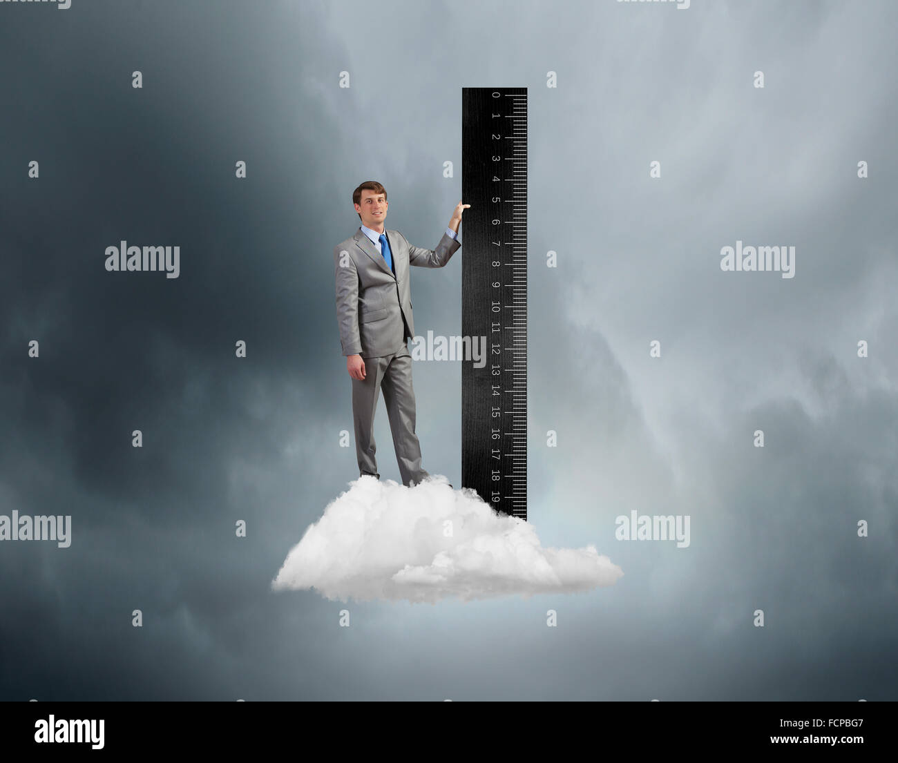 Young businessman in suit measuring ruler benefit Stock Photo - Alamy Young businessman in suit measuring ruler benefit Stock Photo - Alamy