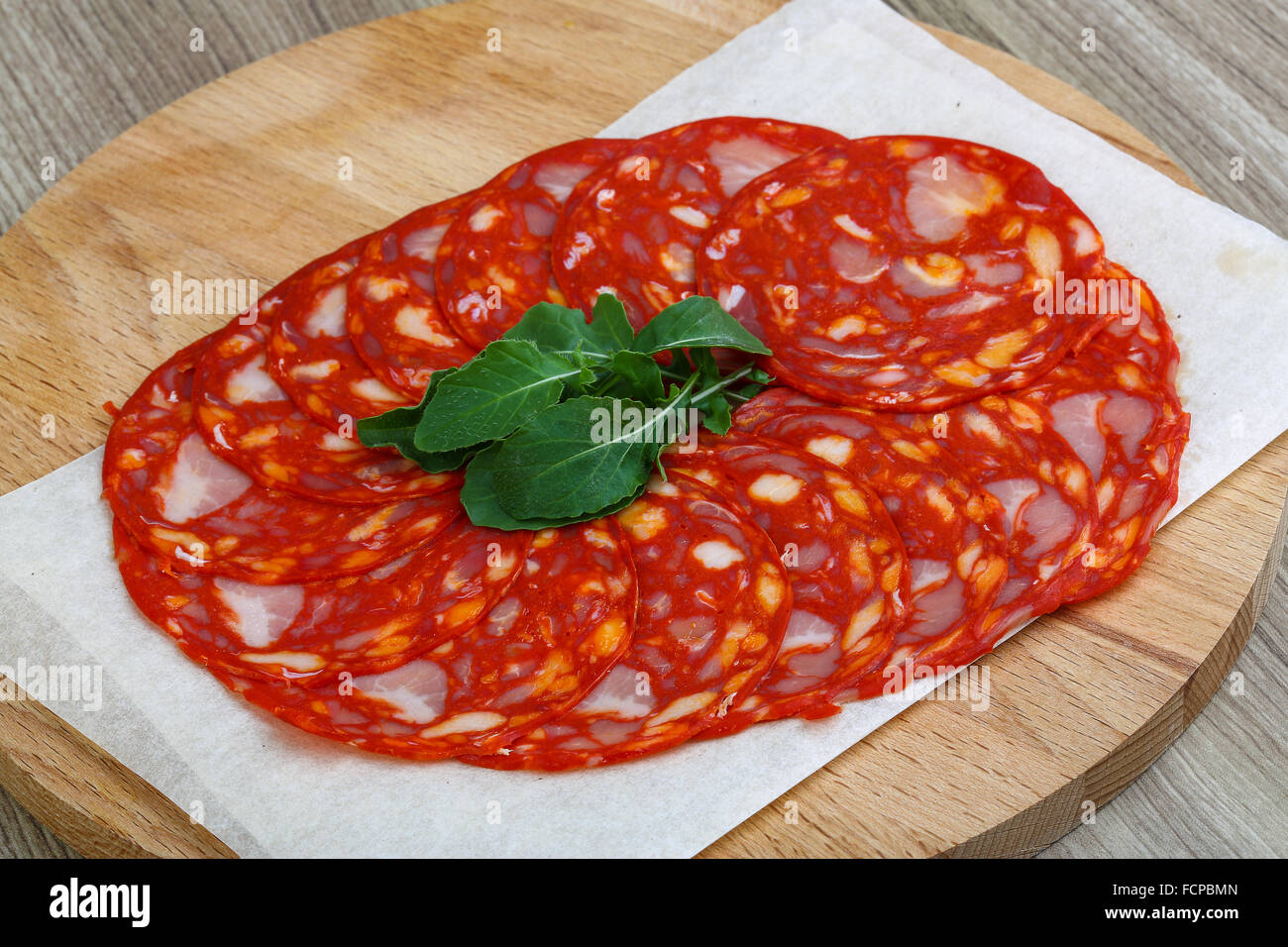 Traditional Spanish salami - Chorizo sausage on the wood background ...