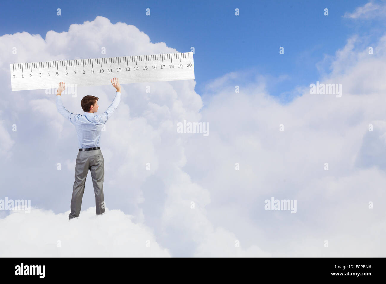 Young businessman in suit measuring ruler benefit Stock Photo - Alamy