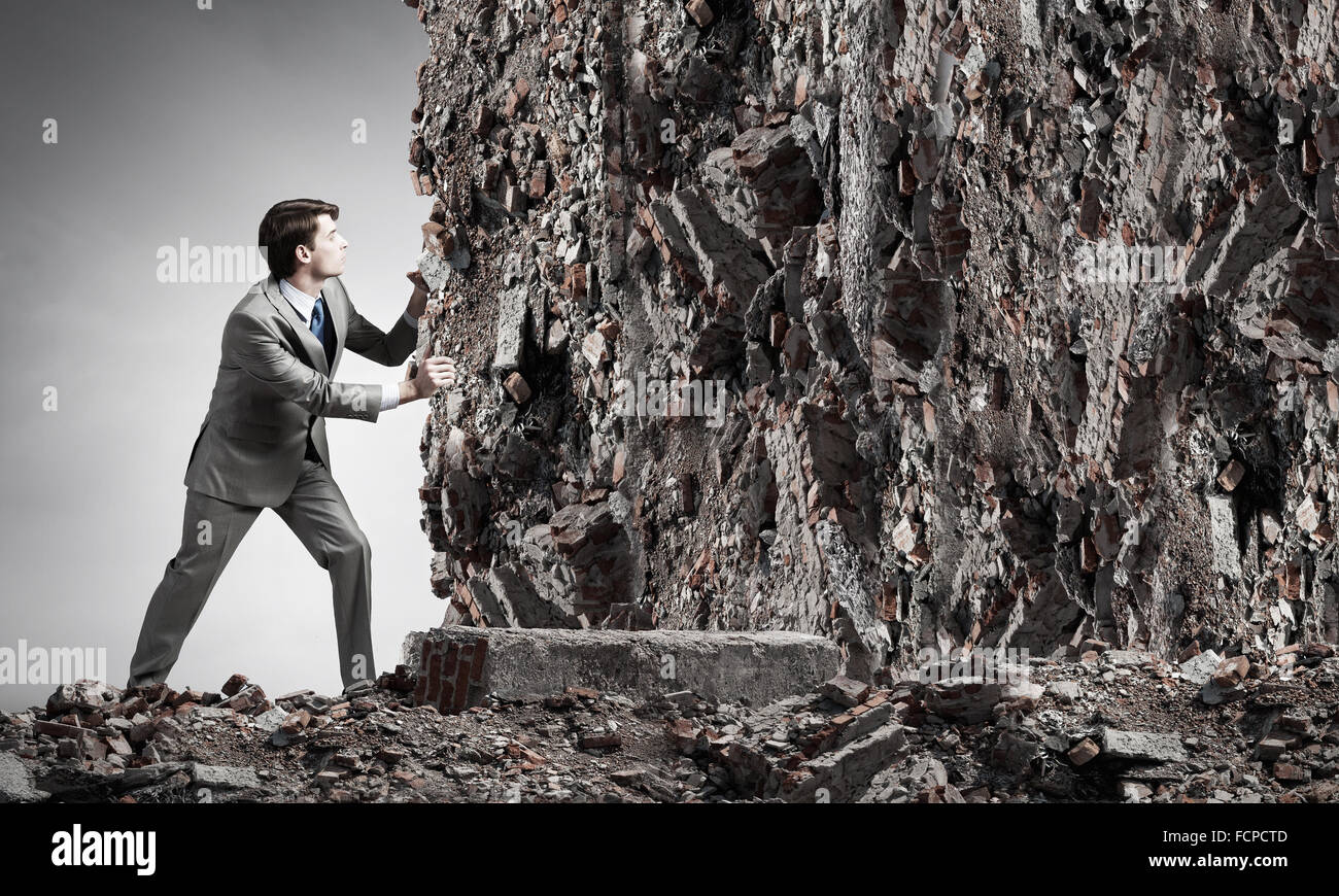 Businessman making effort move hi-res stock photography and images - Alamy