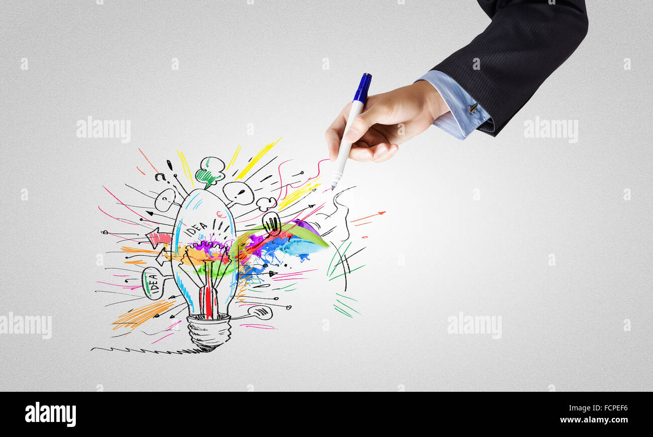 Human hand drawing light bulb isolated on white background Stock Photo ...