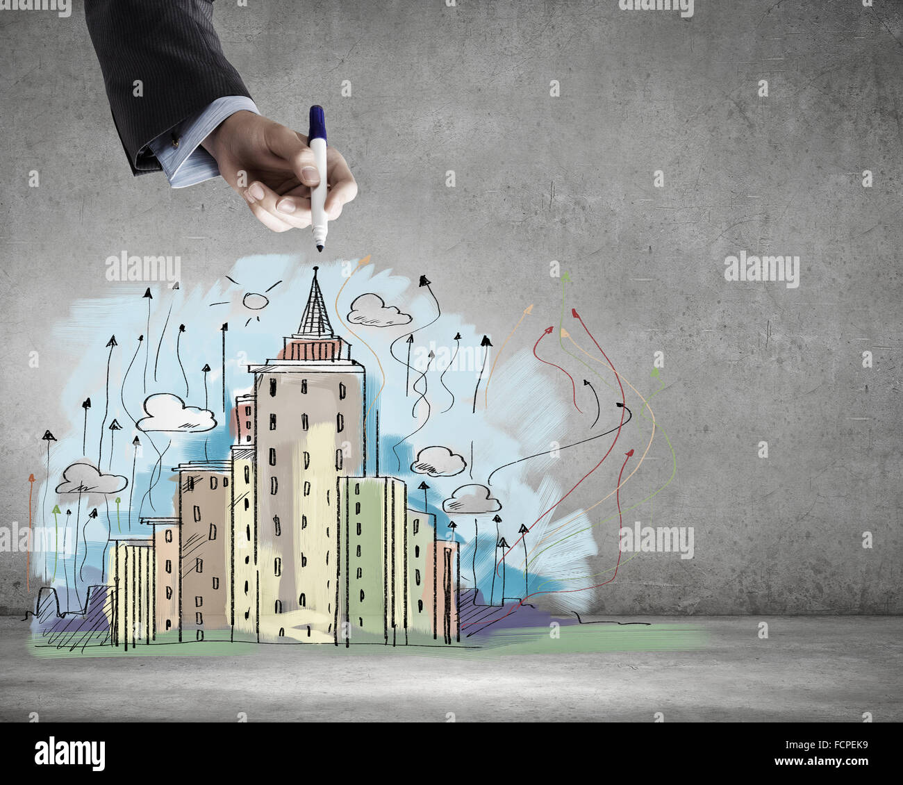 Close up of businessman hand drawing sketches of buildings Stock Photo ...