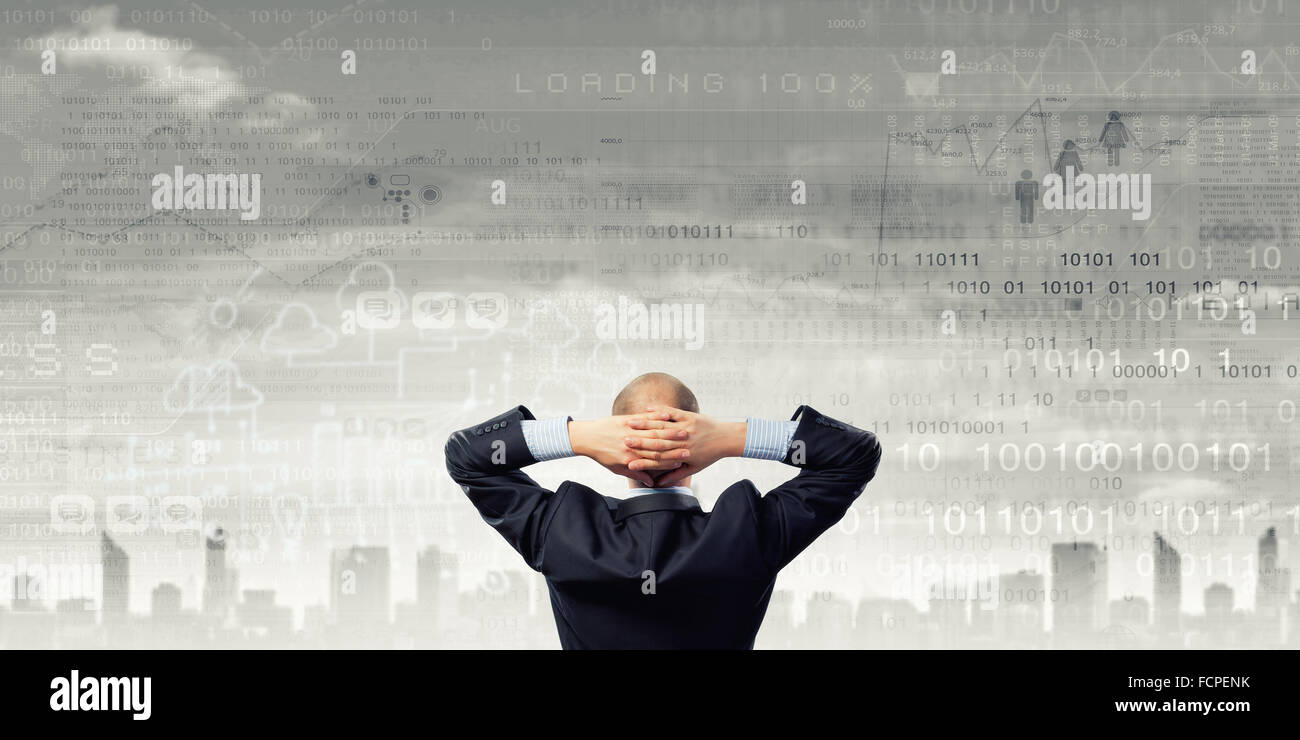 Rear view of businessman looking at business marketing strategy Stock ...