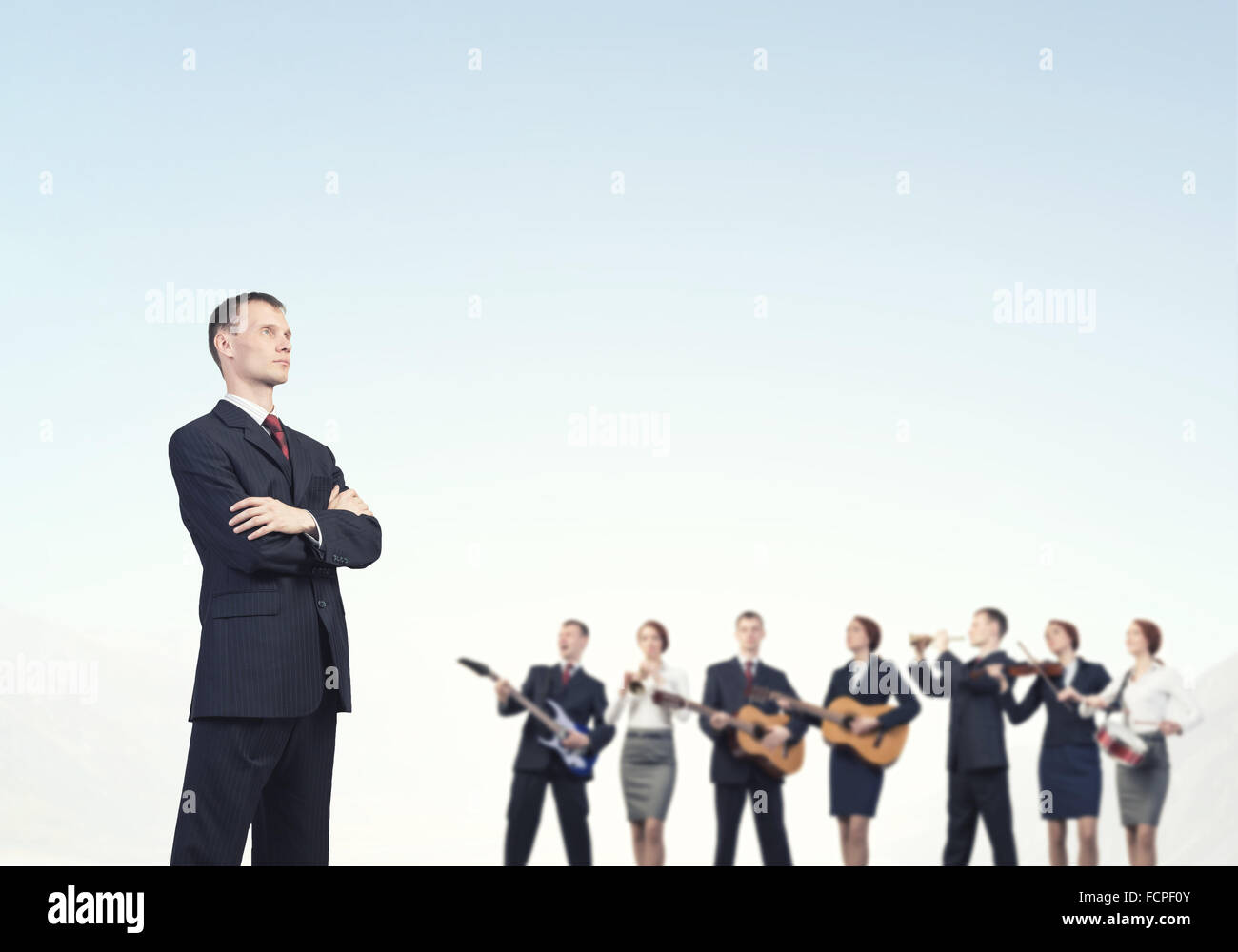 Young man in suit and people playing different music instruments Stock ...