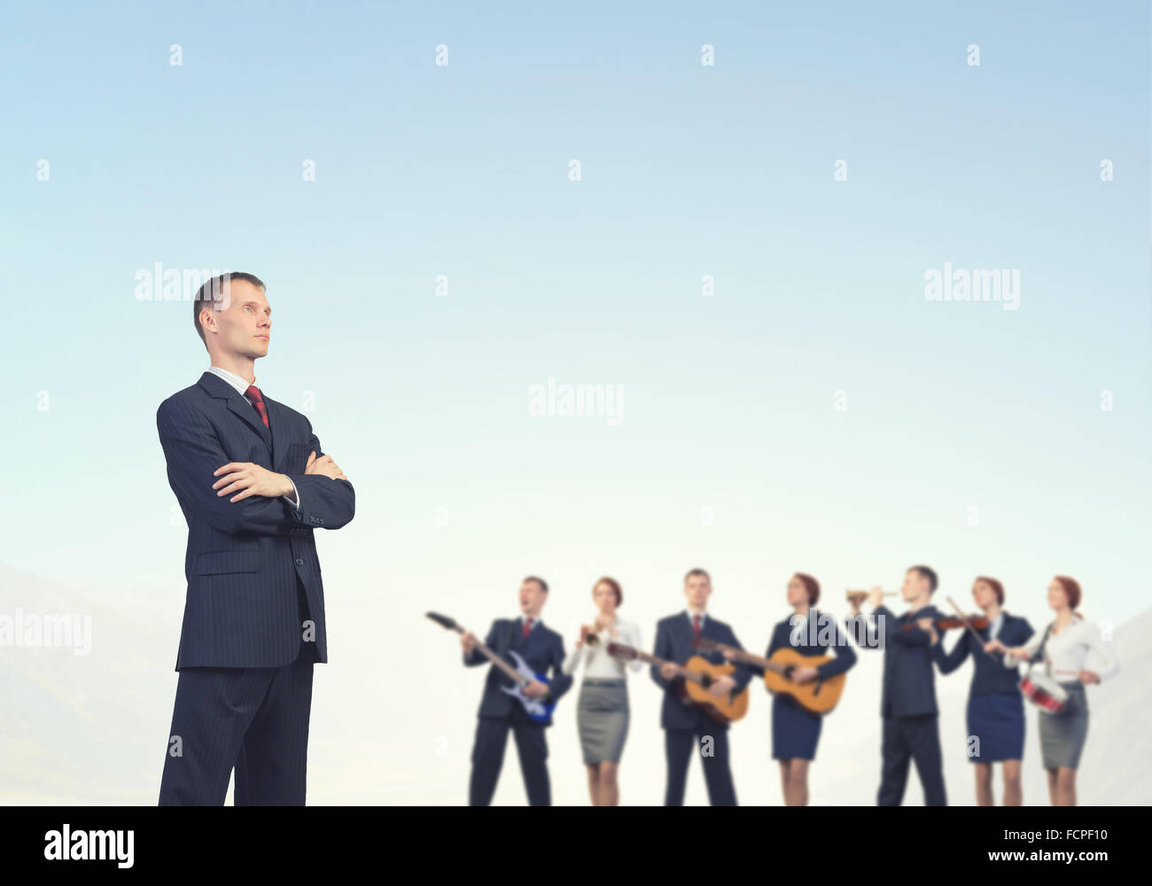 Young man in suit and people playing different music instruments Stock ...