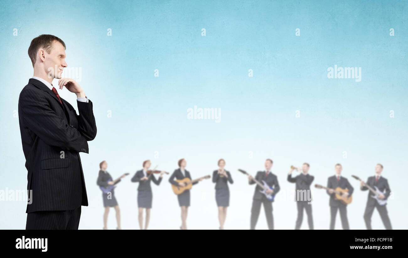 Young man in suit and people playing different music instruments Stock ...