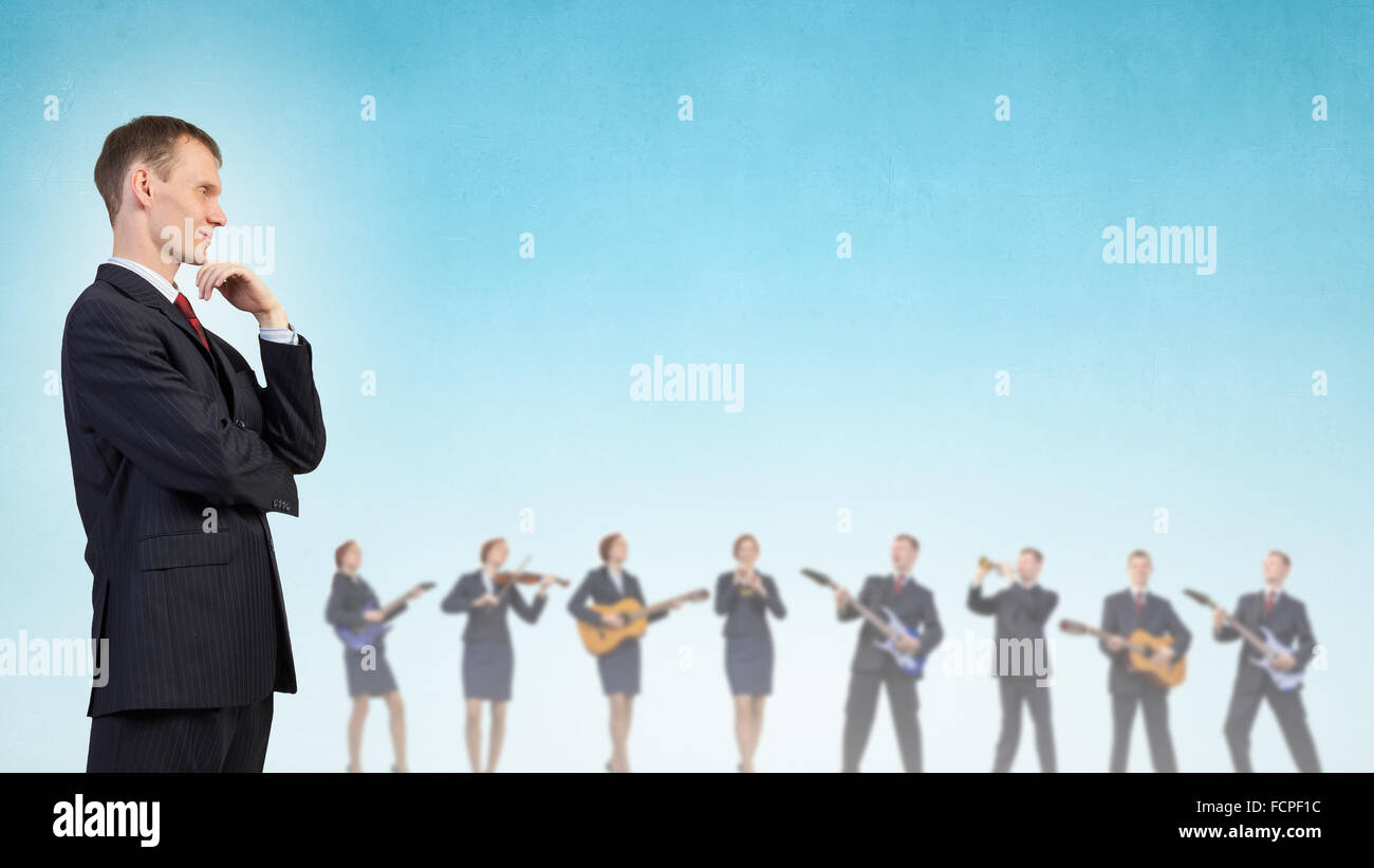 Young man in suit and people playing different music instruments Stock ...