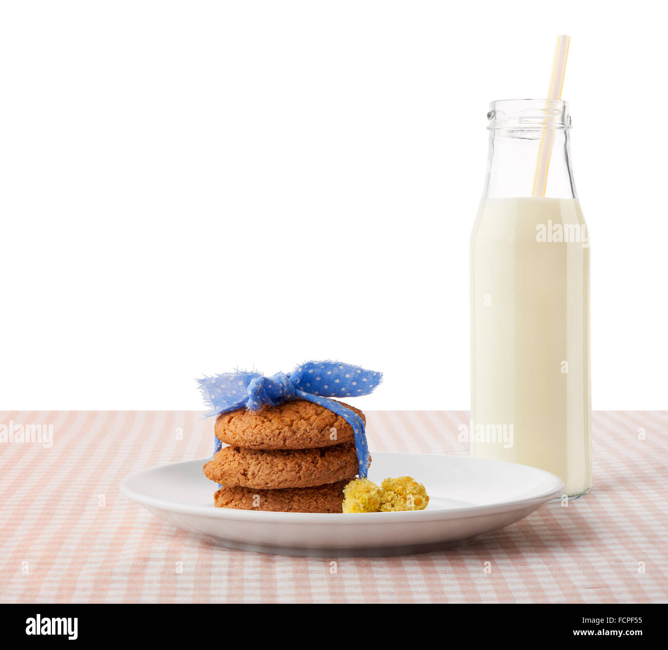 Stack of three homemade oatmeal cookies tied with blue ribbon and ...