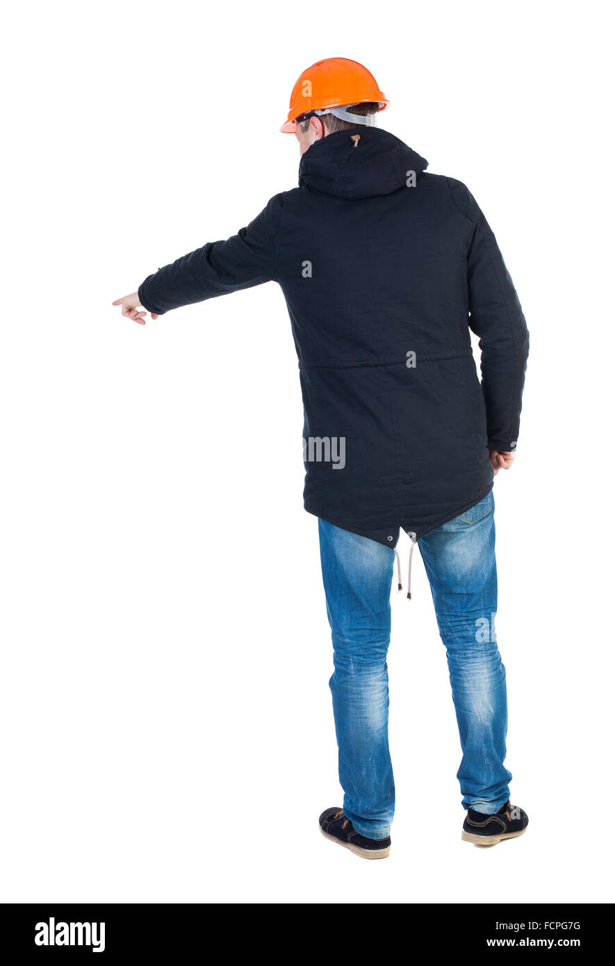 Back view of pointing young men in parka and helmet. Young guy gesture ...