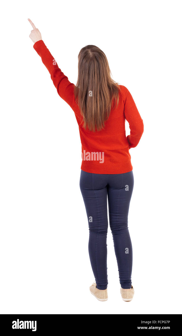 Back view of pointing woman. beautiful girl. Rear view people ...