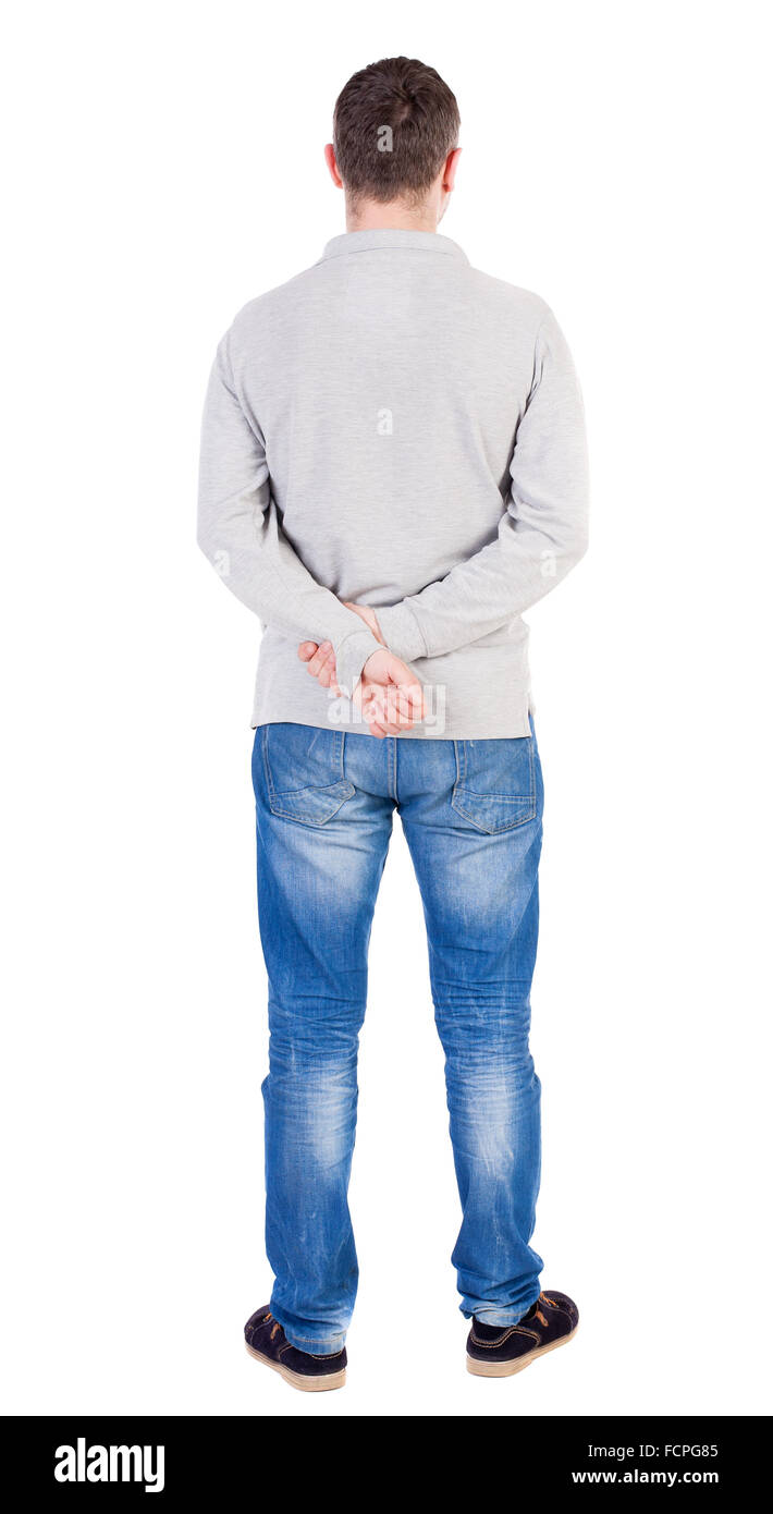Back view of man in jeans. Standing young guy. Rear view people ...