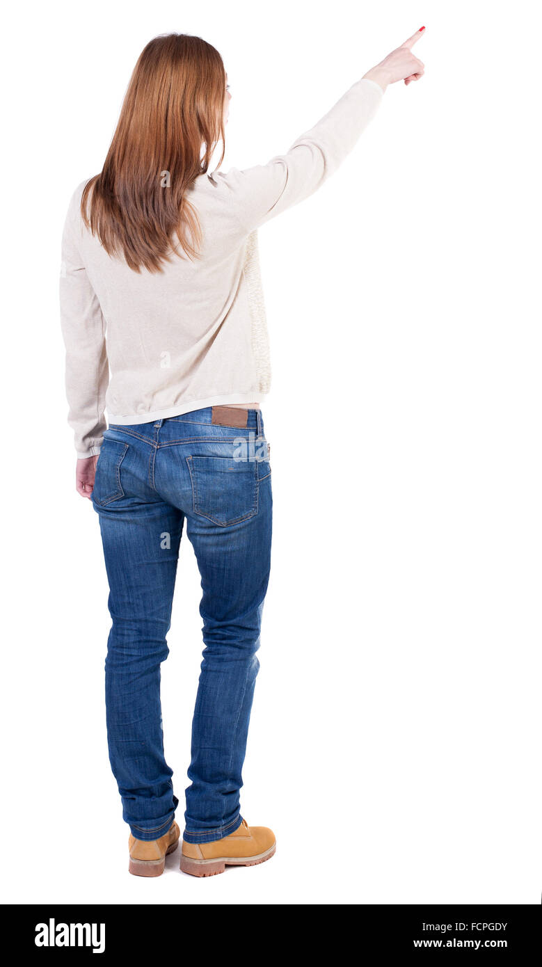 Back view of pointing woman. beautiful girl. Rear view people ...
