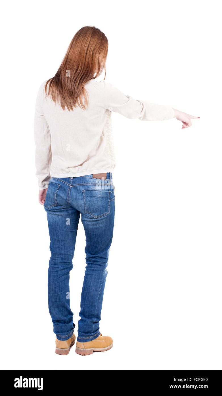 Back view of pointing woman. beautiful girl. Rear view people ...