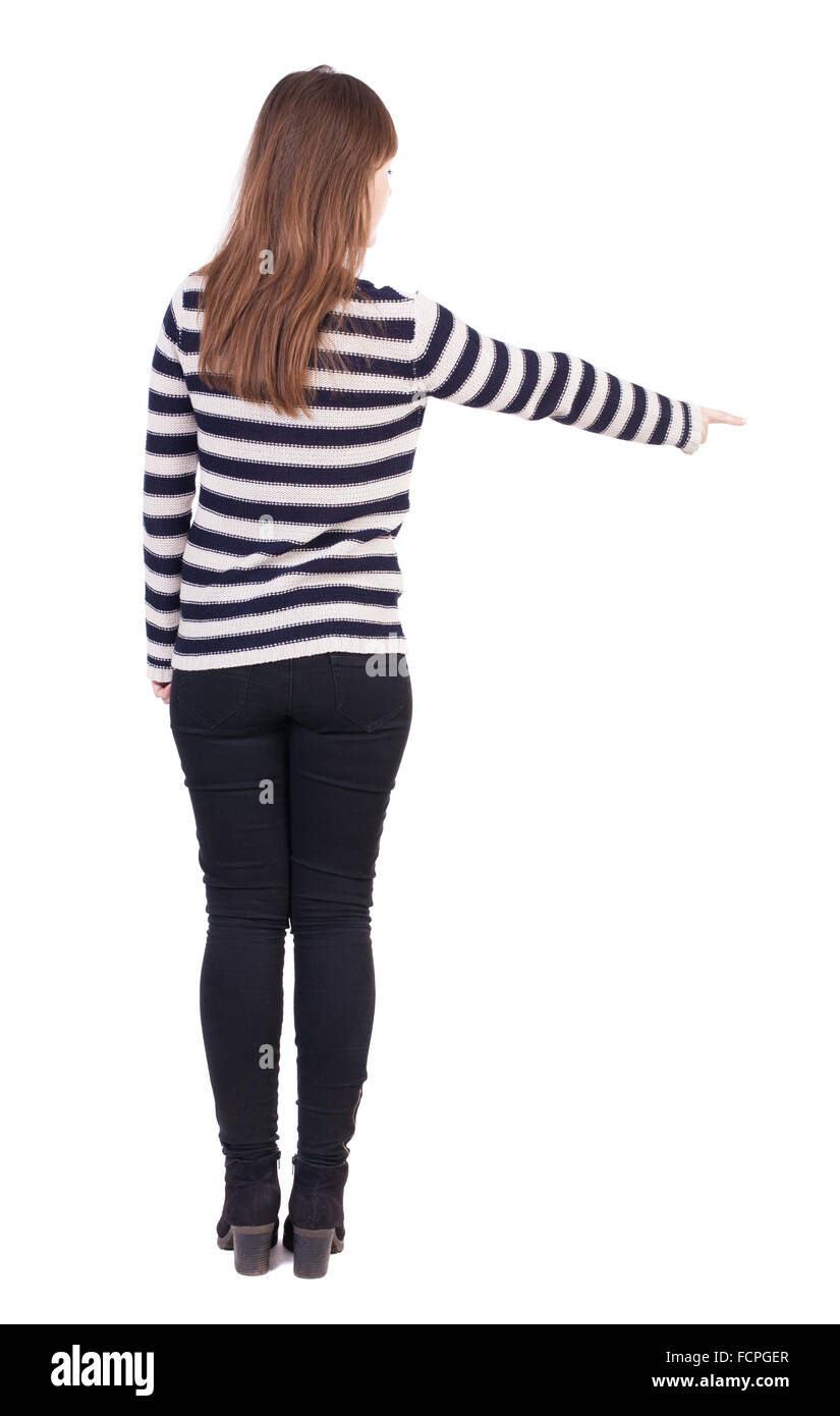 Back view of pointing woman. beautiful girl. Rear view people ...
