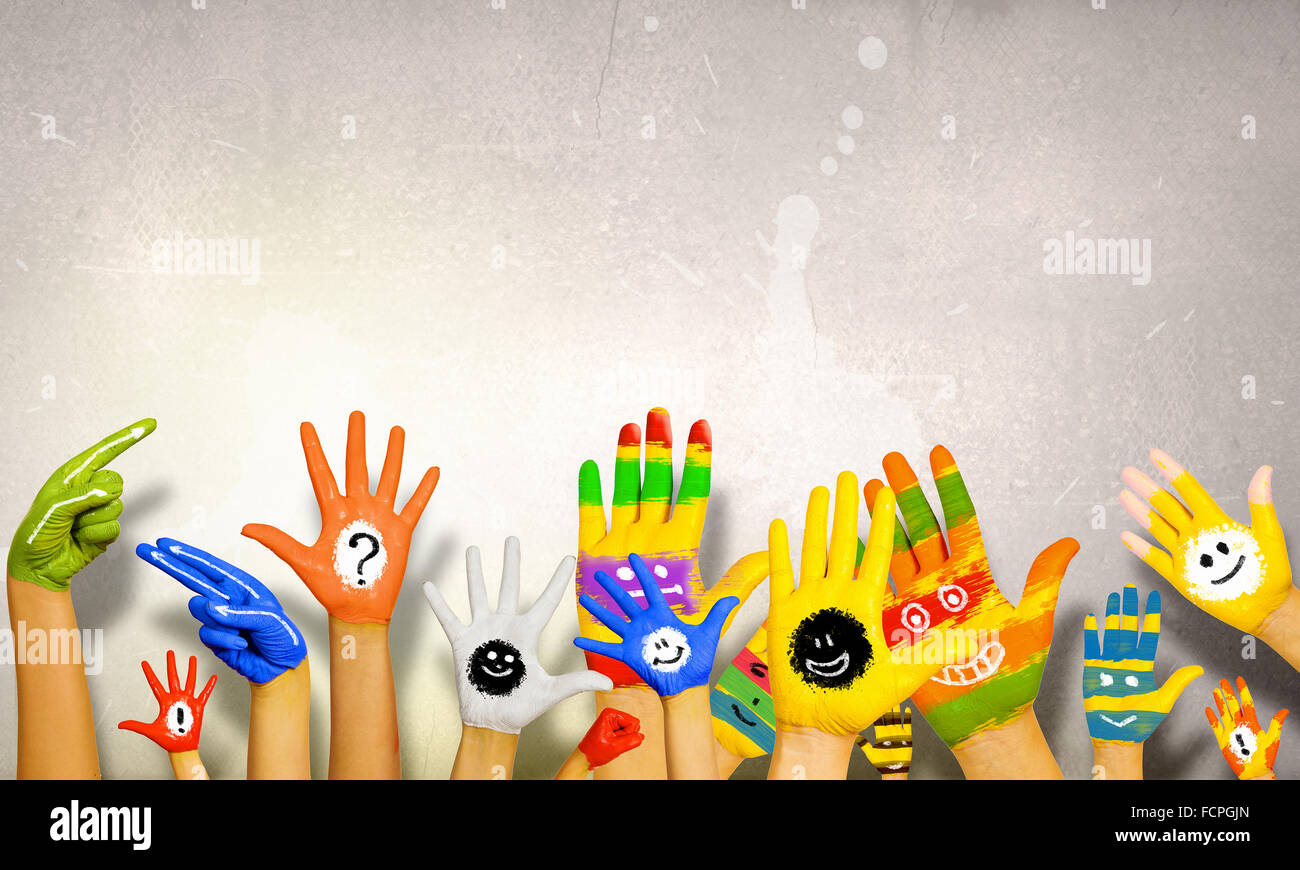 Image of human hands in colorful paint with smiles Stock Photo - Alamy