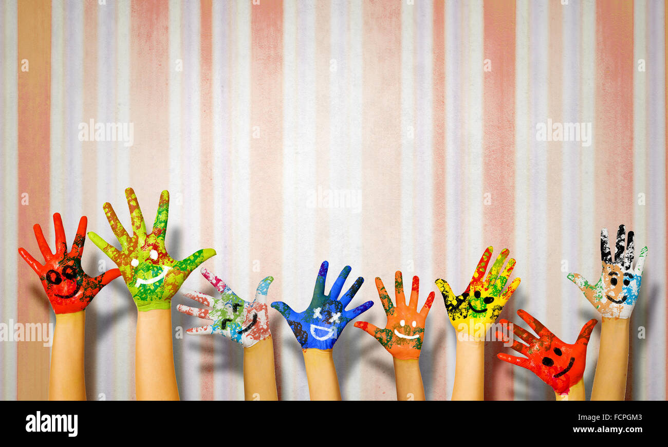 Image of human hands in colorful paint with smiles Stock Photo - Alamy