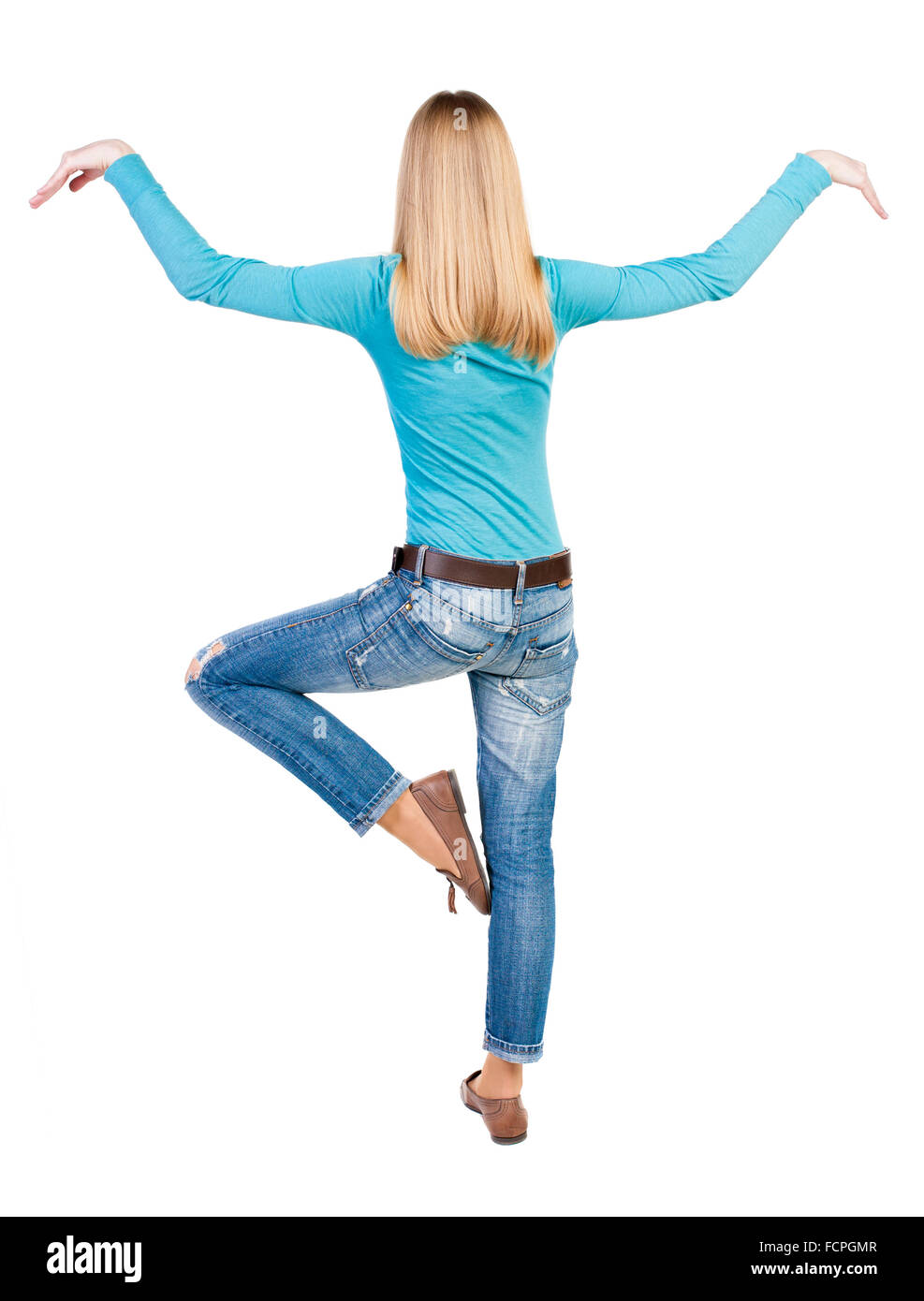 Balancing young woman. or dodge falling woman. Rear view people ...