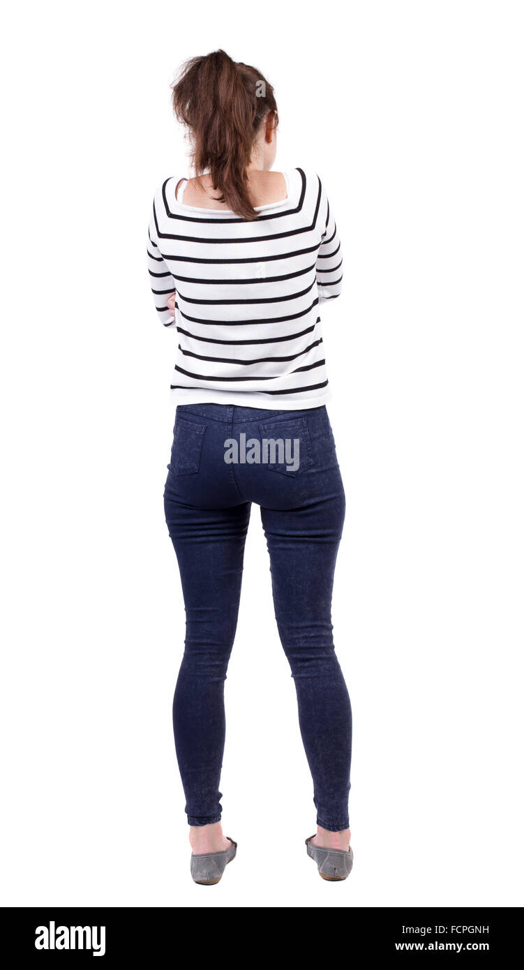 back view of standing young beautiful woman. girl watching. Rear view ...