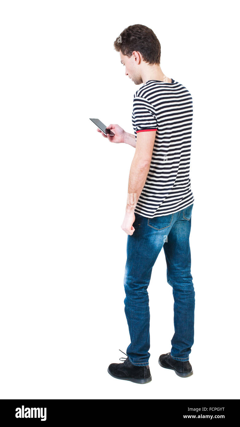 back view of man in suit talking on mobile phone. rear view people ...