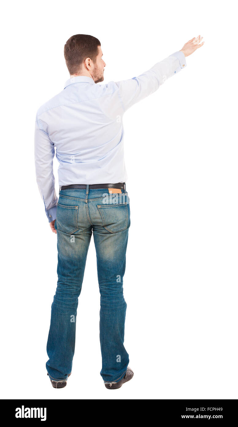 Back view of pointing business man. gesticulating young guy in black ...