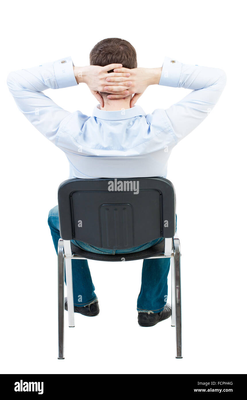back view of business man sitting on chair. businessman watching. Rear ...
