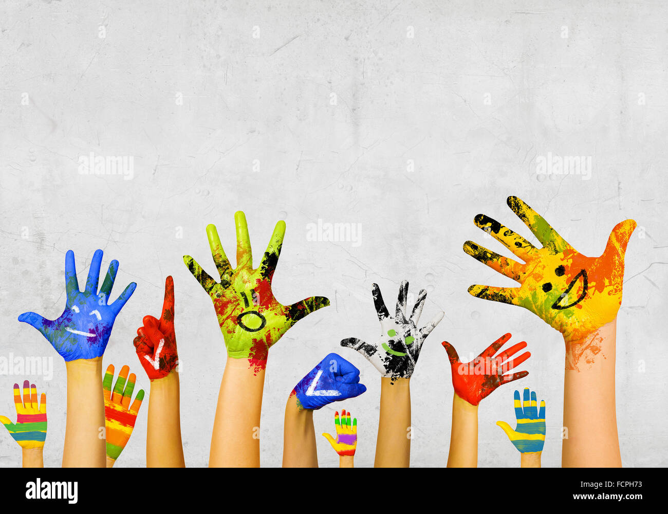 Image of human hands in colorful paint with smiles Stock Photo - Alamy