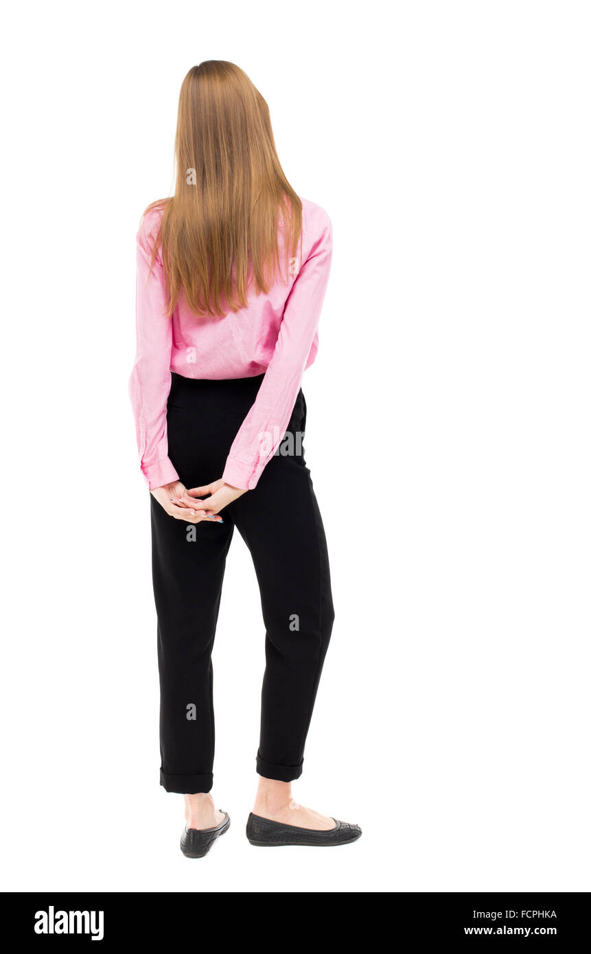 back view of standing young beautiful woman. girl watching. Rear view ...