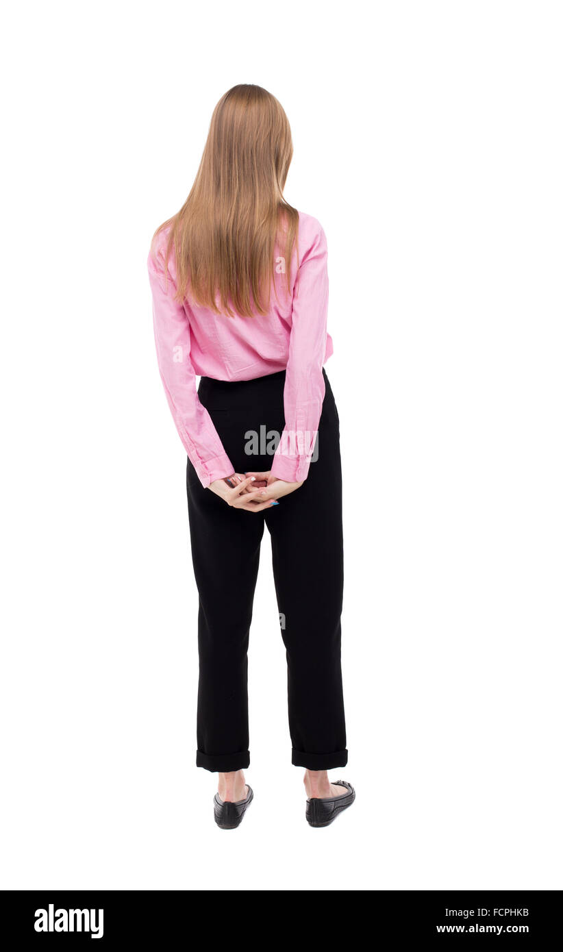 back view of standing young beautiful woman. girl watching. Rear view ...