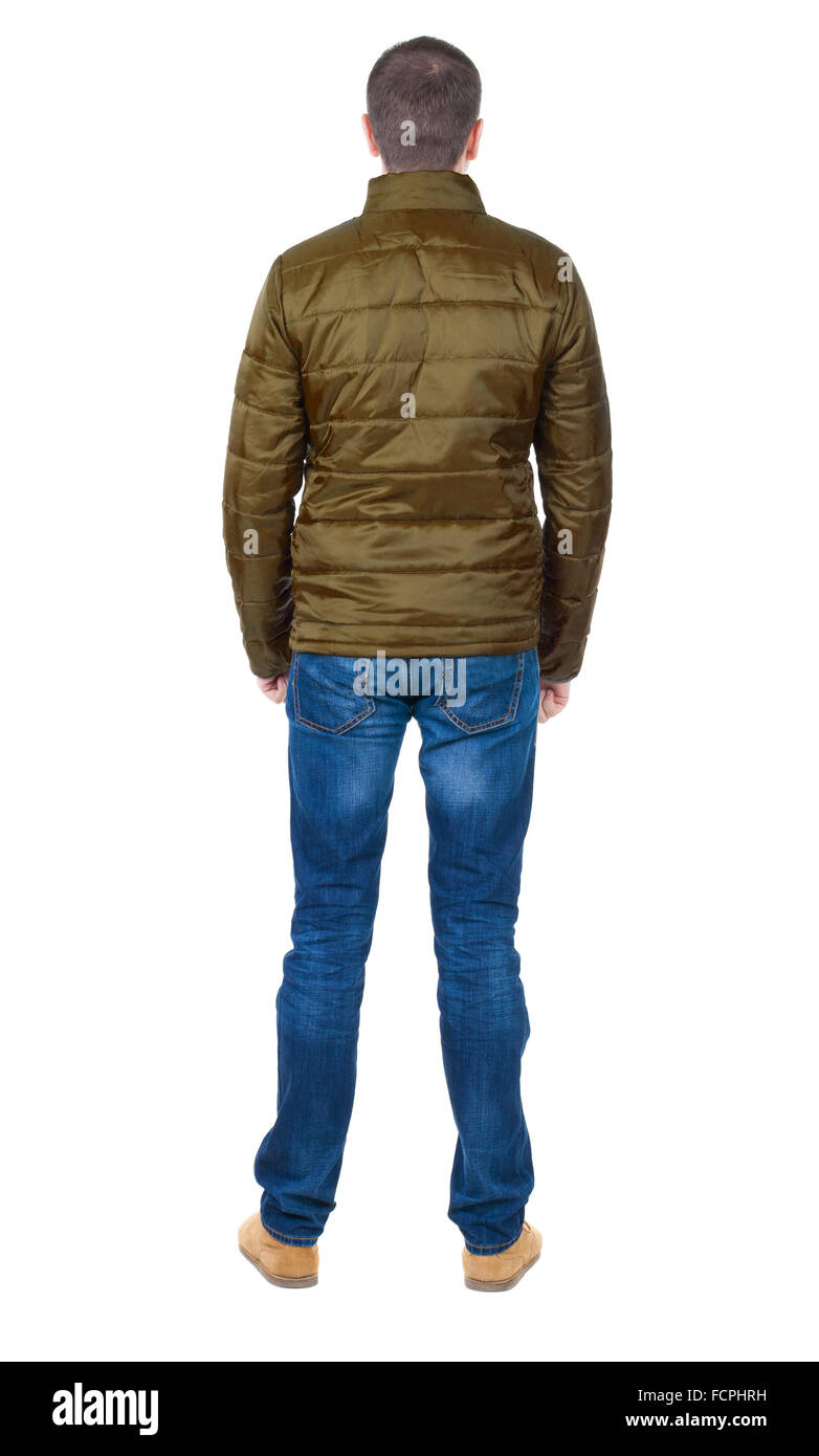 Back view of handsome man in blue windcheater looking. Standing young ...