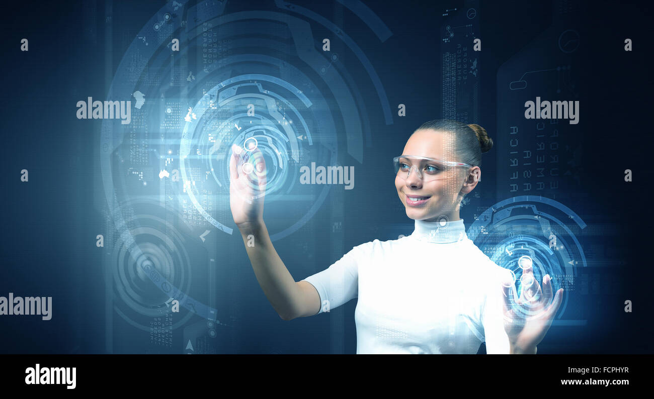 Picture of futuristic woman working with virtual technology Stock Photo ...