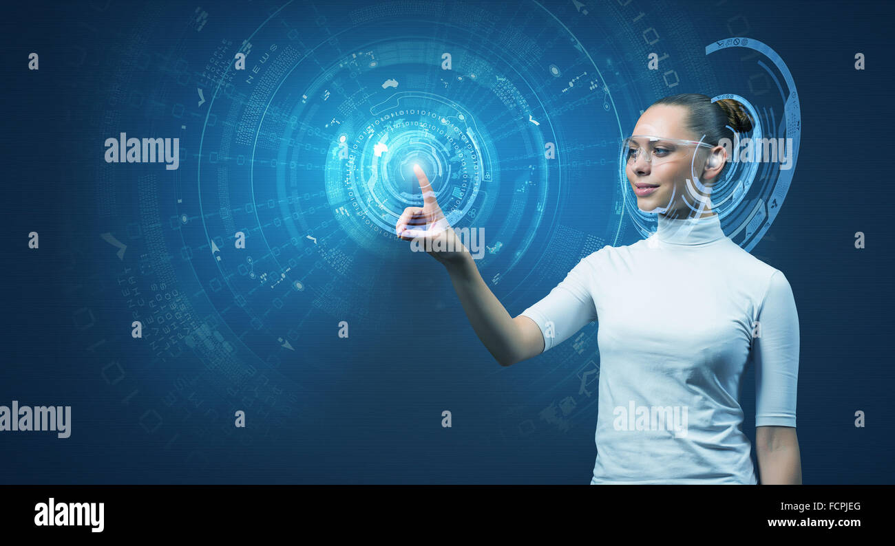 Picture of futuristic woman working with virtual technology Stock Photo ...
