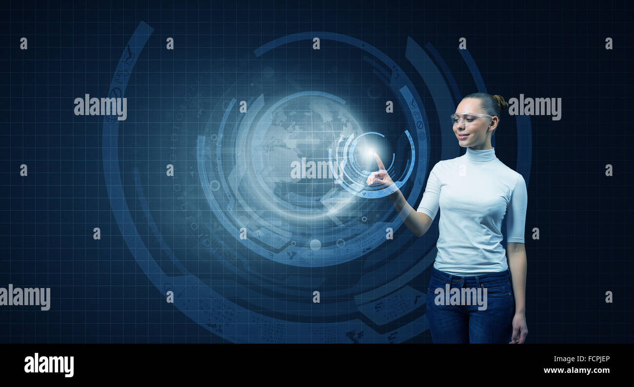 Picture of futuristic woman working with virtual technology Stock Photo ...