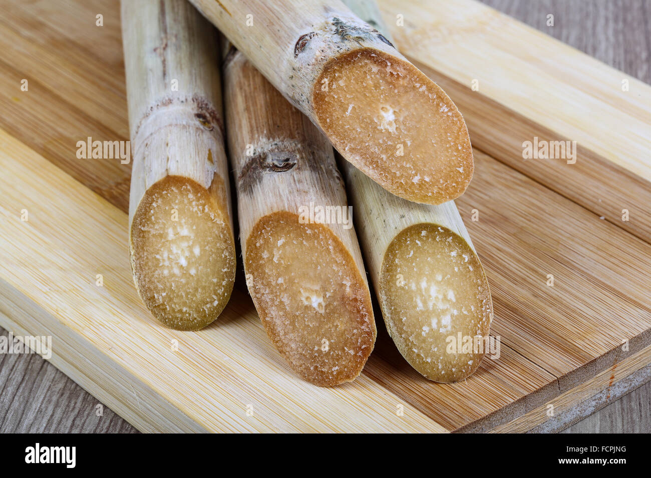 Ripe Sugar sticks on the wood background Stock Photo - Alamy