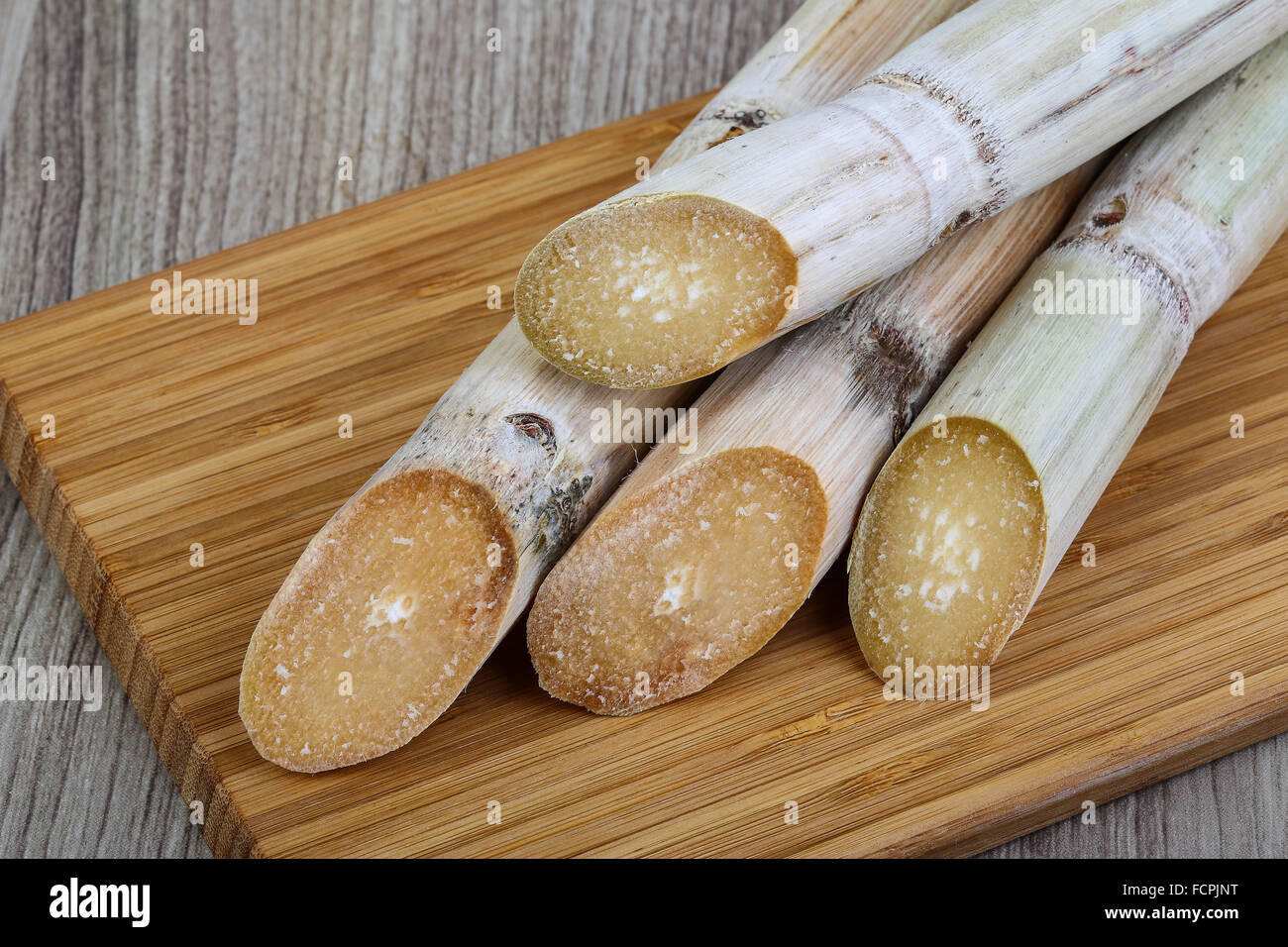 Ripe Sugar sticks on the wood background Stock Photo - Alamy