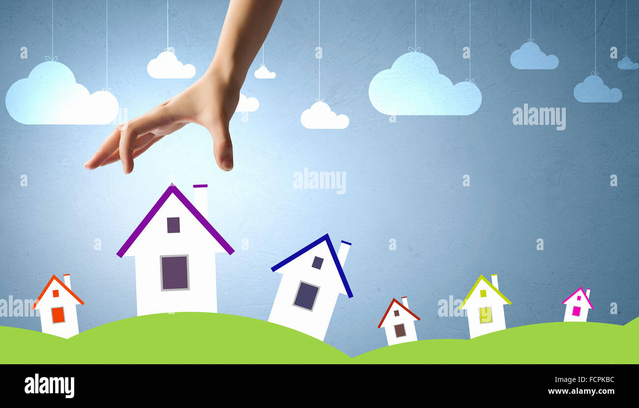 Human hand grabs drawn on paper house Stock Photo - Alamy