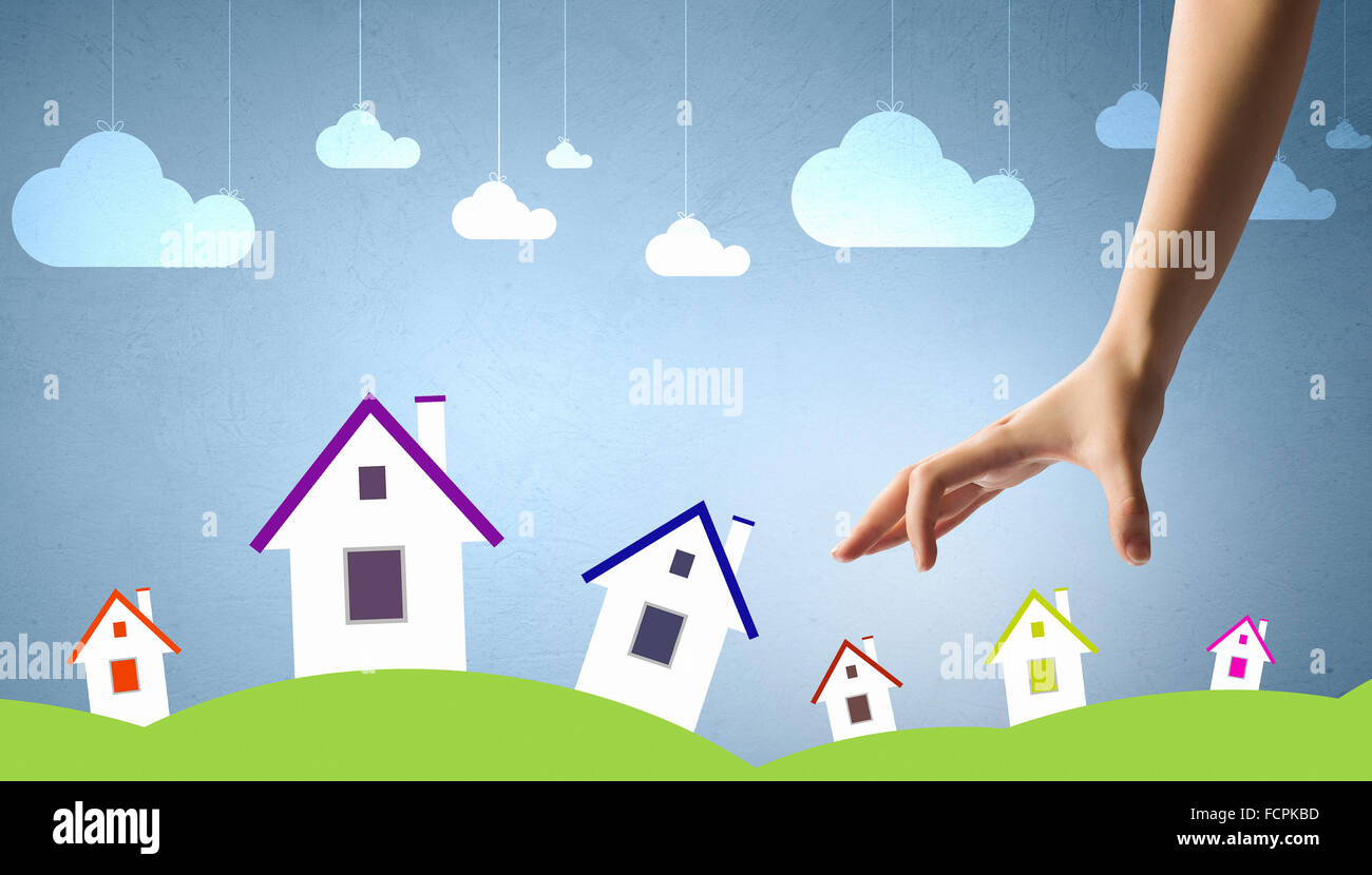 Human hand grabs drawn on paper house Stock Photo - Alamy